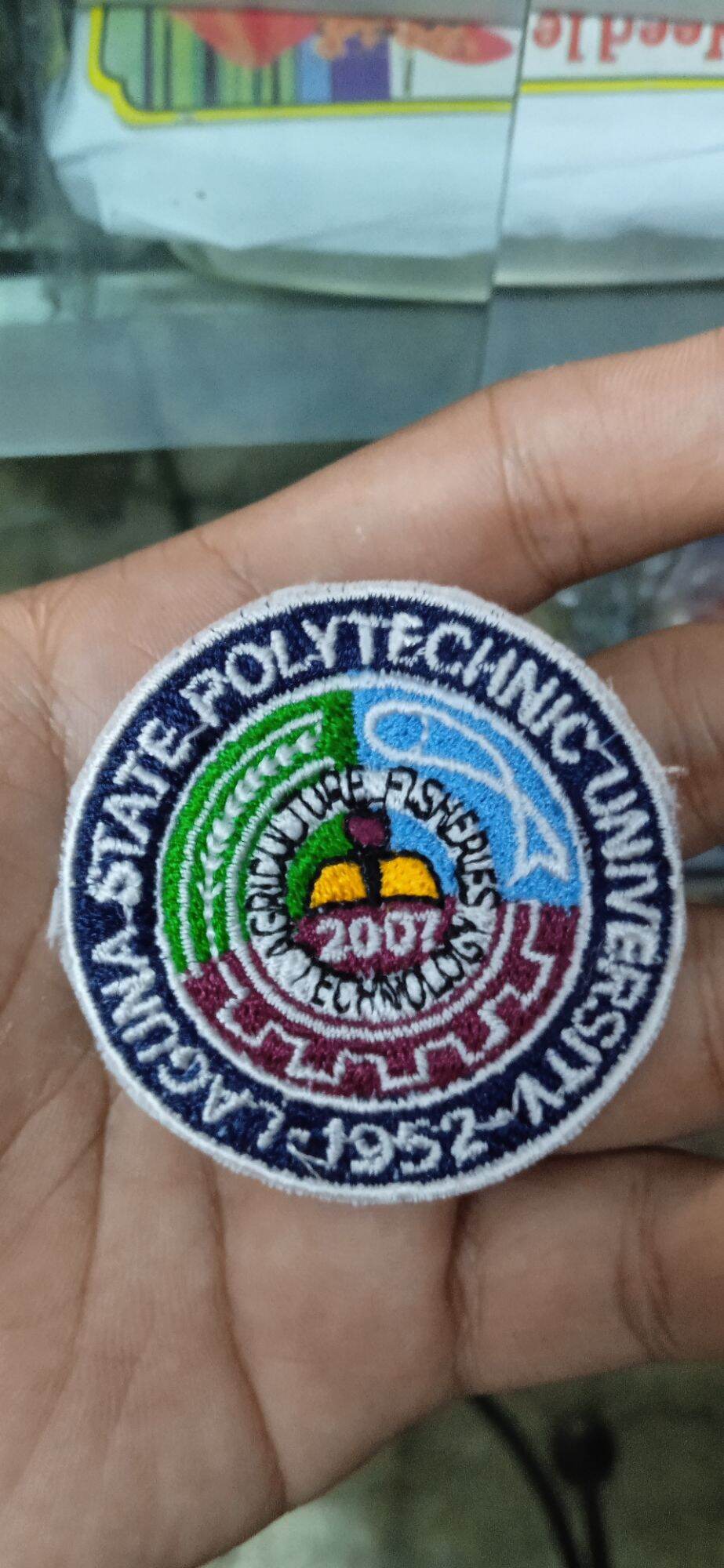 Laguna State Polytechnic University Logo Gears Publication