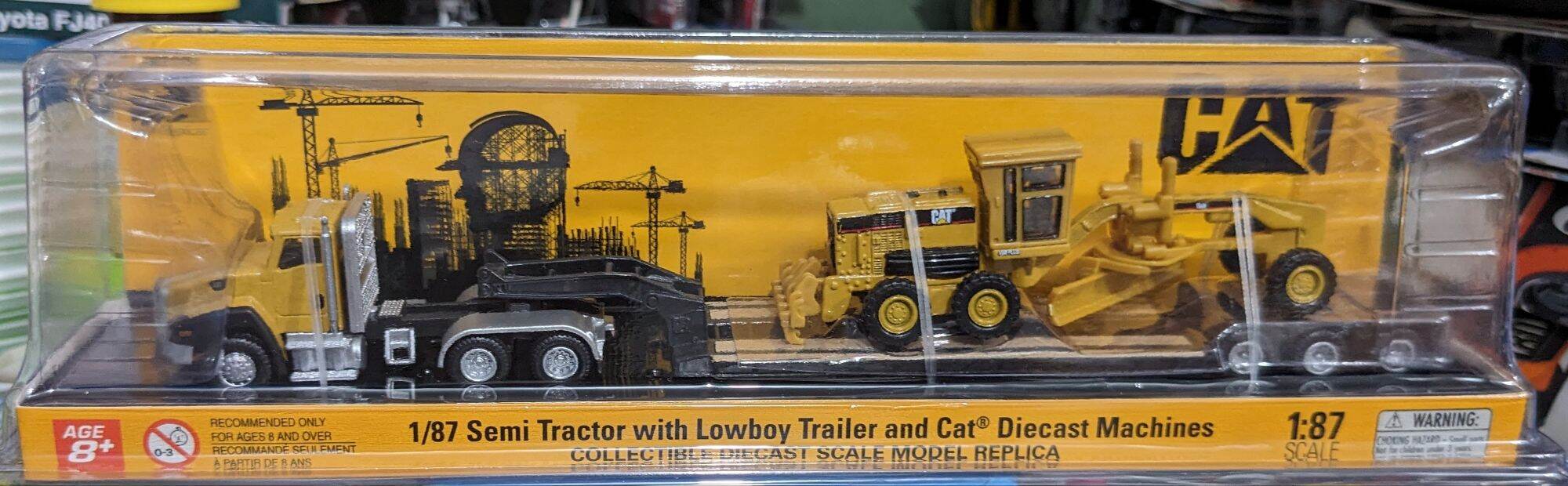 CAT 1:87 scale Semi Tractor with Lowboy Trailer and Cat Diecast Machine ...